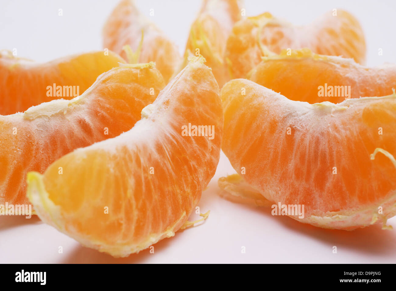 Sliced tangerine hi-res stock photography and images - Alamy