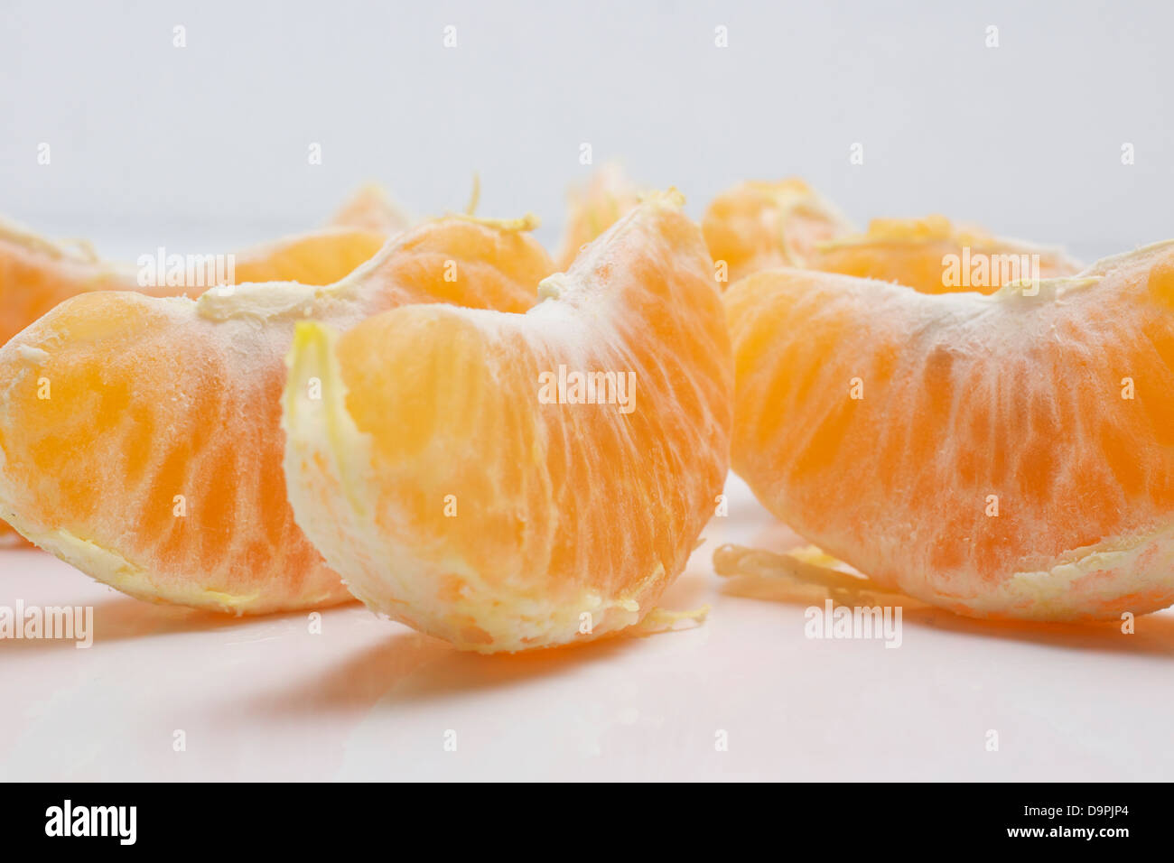 Sliced tangerine hi-res stock photography and images - Alamy