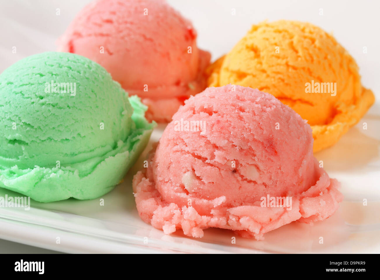 Scoops of ice cream on square plate Stock Photo - Alamy