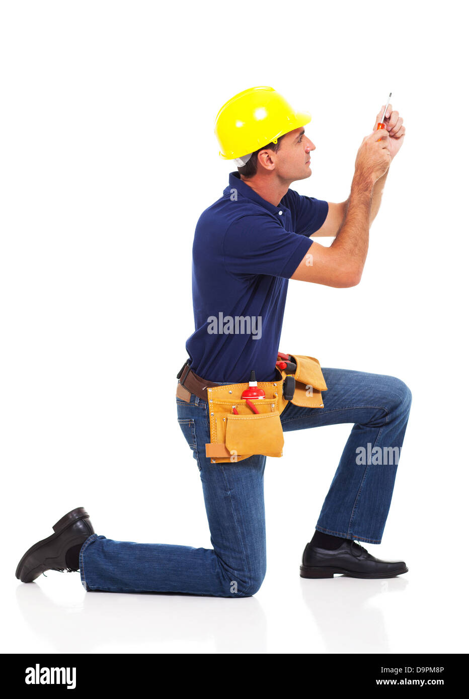 handyman working using screwdriver over white background Stock Photo ...