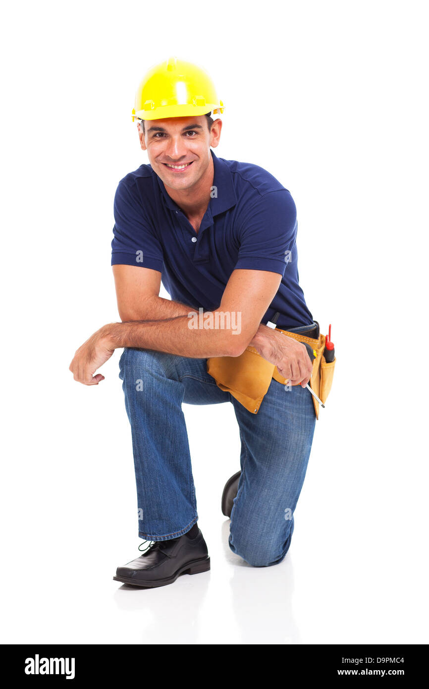 happy male constructor kneeling over white background Stock Photo - Alamy