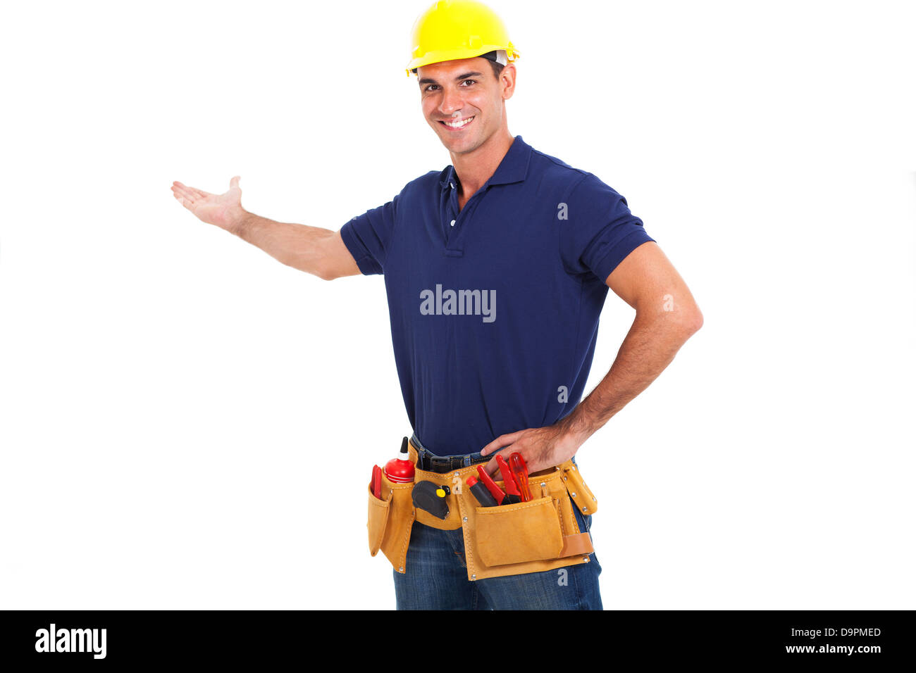 portrait of smiling handyman presenting on white background Stock Photo ...