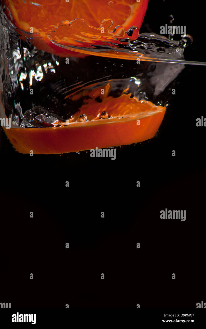 Orange water splash hi-res stock photography and images - Alamy