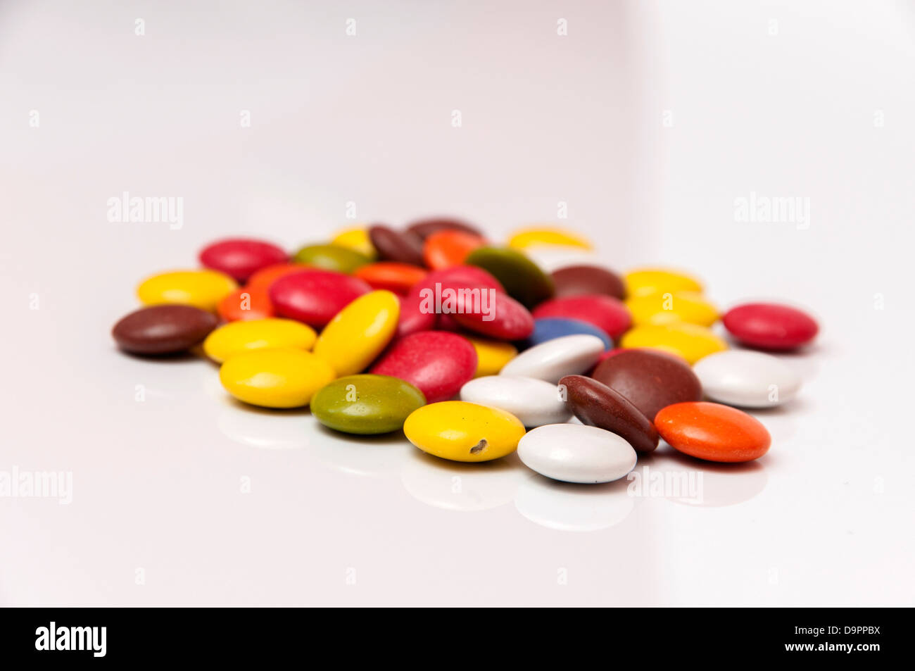 called Smarties candies of all colors and flavors Stock Photo - Alamy