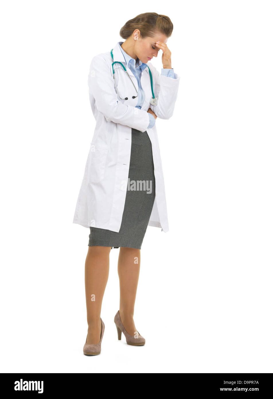 Full length portrait of concerned doctor woman Stock Photo - Alamy