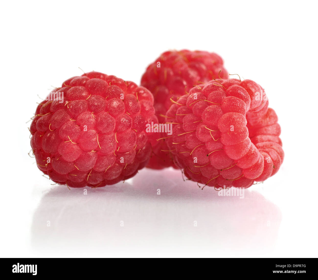 Ripe raspberries isolated on white background Stock Photo - Alamy