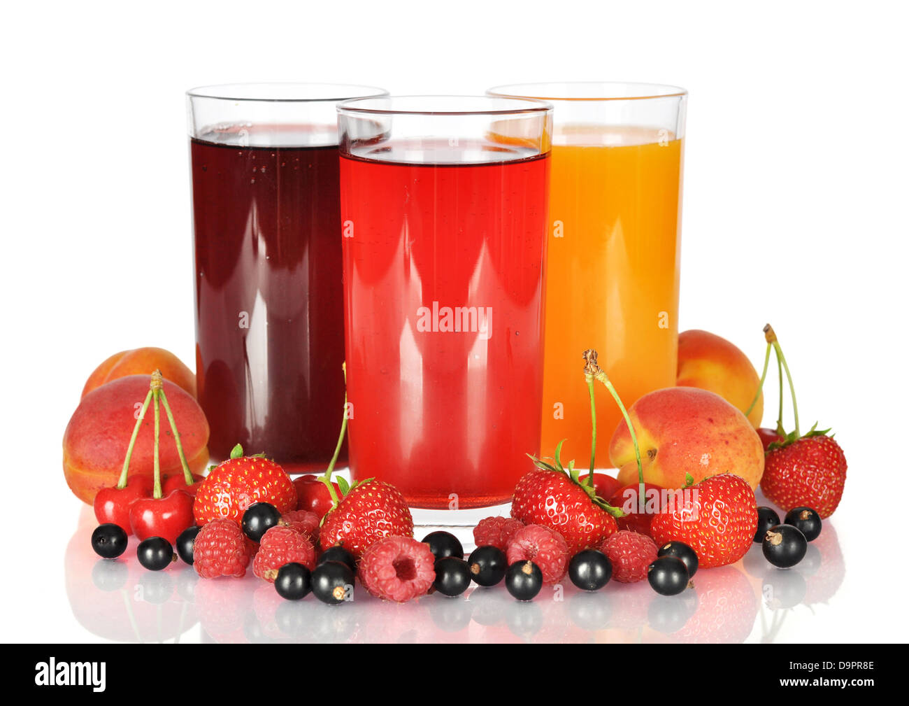 Berry juice in glasses with fresh berries isolated on white background ...