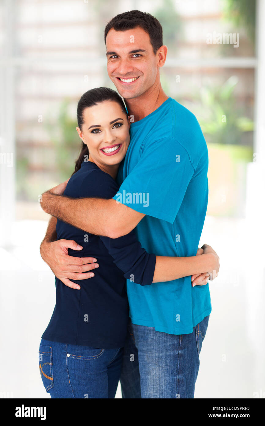 Loving young couple hugging hi-res stock photography and images - Alamy
