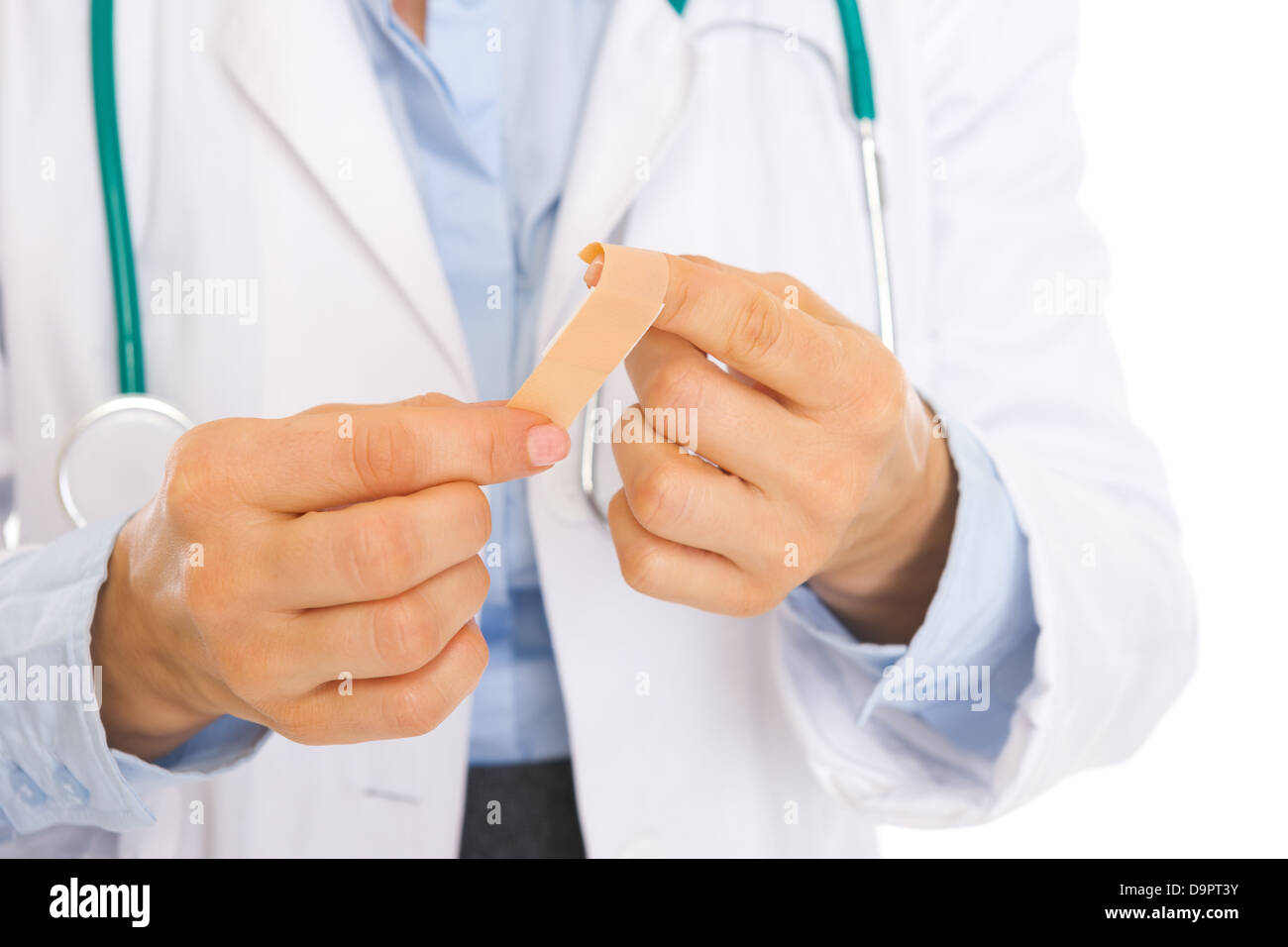 Closeup on doctor woman using patch on wounded finger Stock Photo - Alamy