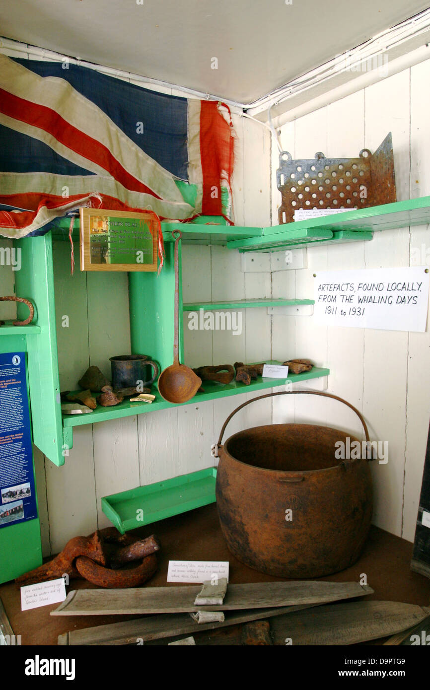 British flag and various items on display at the Port Lockroy museum ...