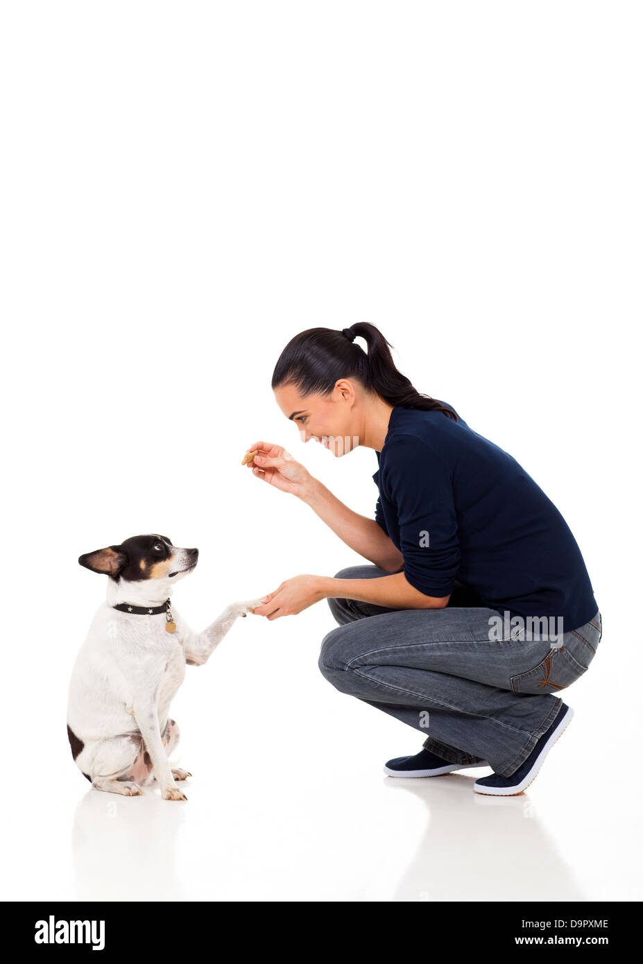 Woman giving treat hi-res stock photography and images - Alamy