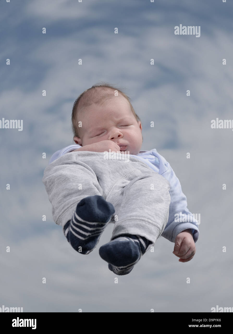 Dreaming sleeping baby Stock Photo - Alamy