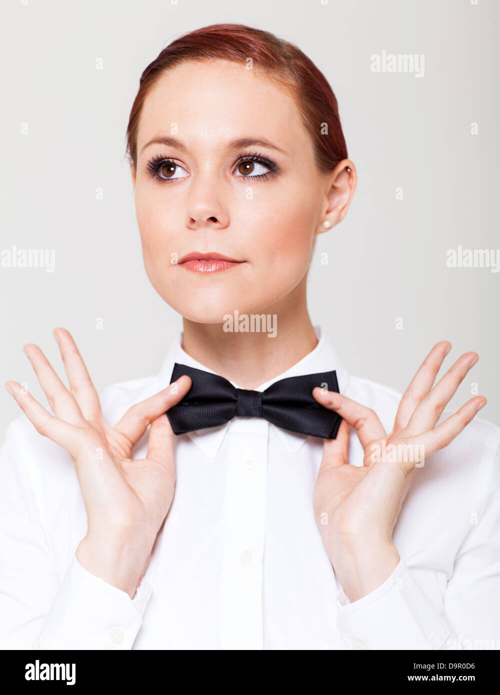 Woman bow tie hi-res stock photography and images - Alamy