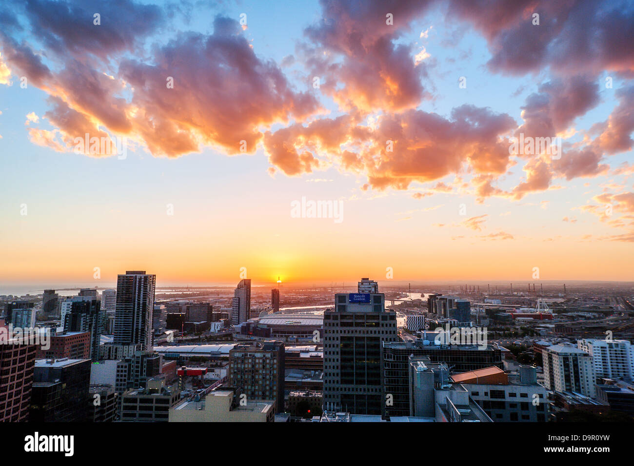 A burning sunset ends a hot day in Melbourne, the capital of the ...