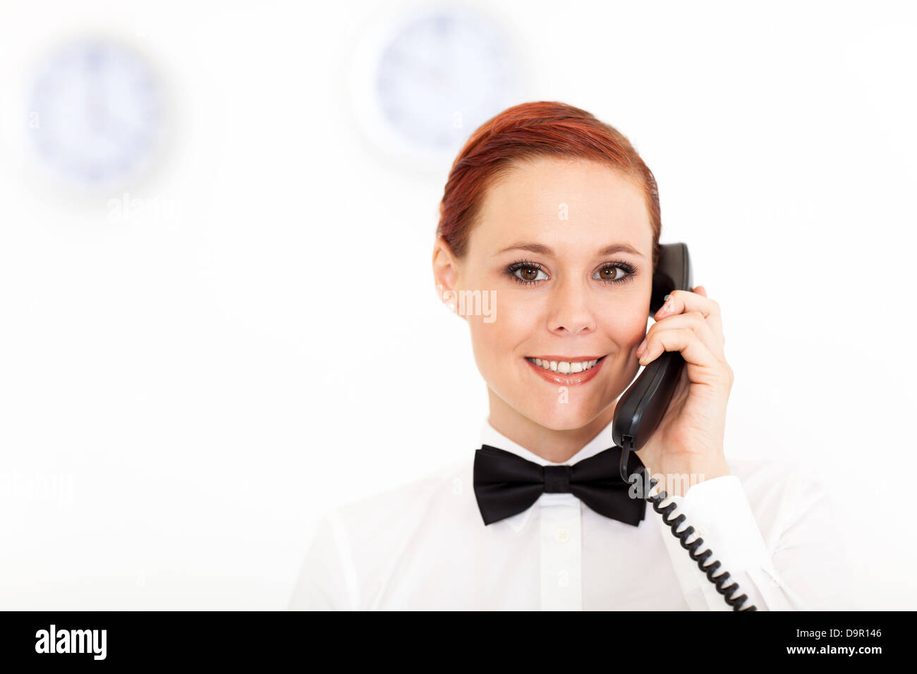 Black hotel receptionist hi-res stock photography and images - Alamy