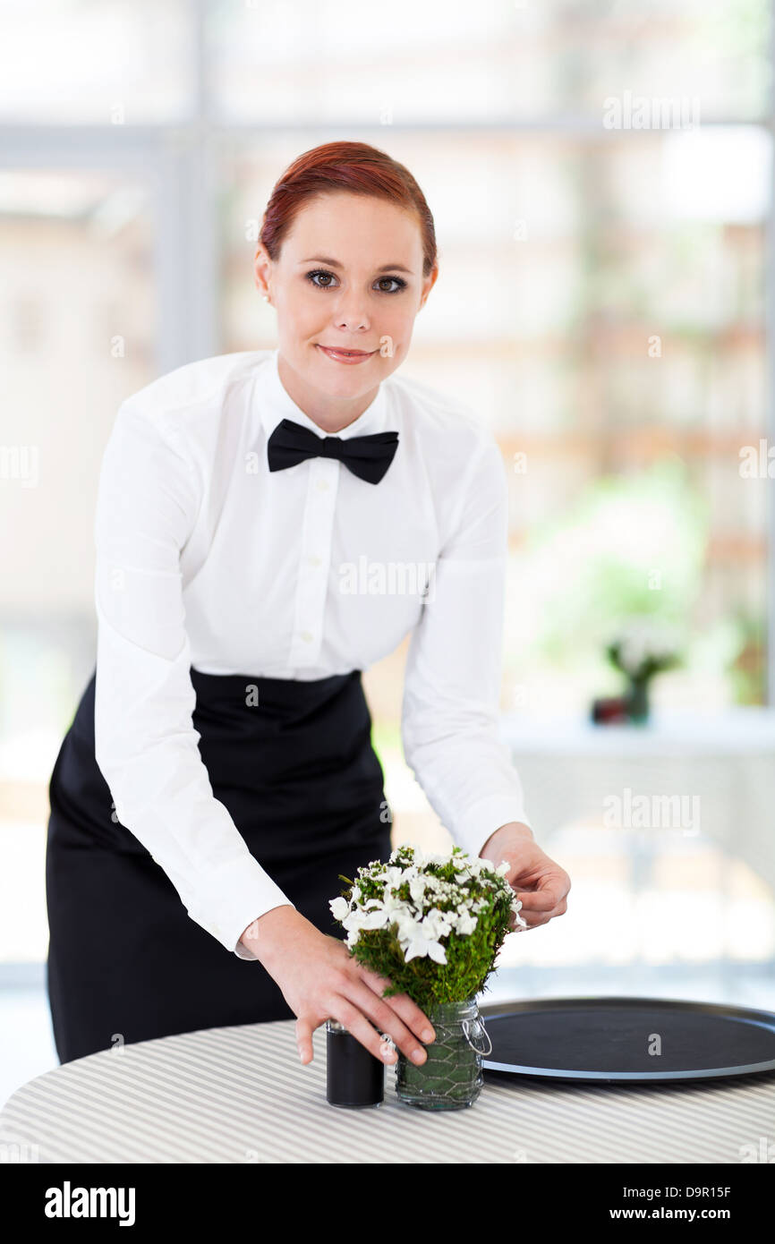 pretty young waitress working in modern restaurant Stock Photo - Alamy