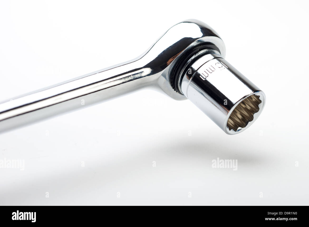 metal ratchet with socket set on white background Stock Photo - Alamy