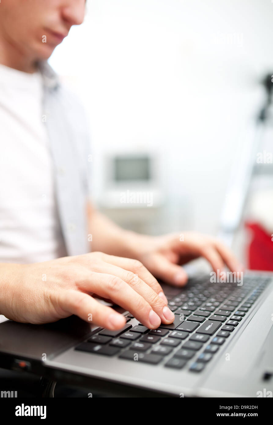 Man working on the laptop Stock Photo - Alamy