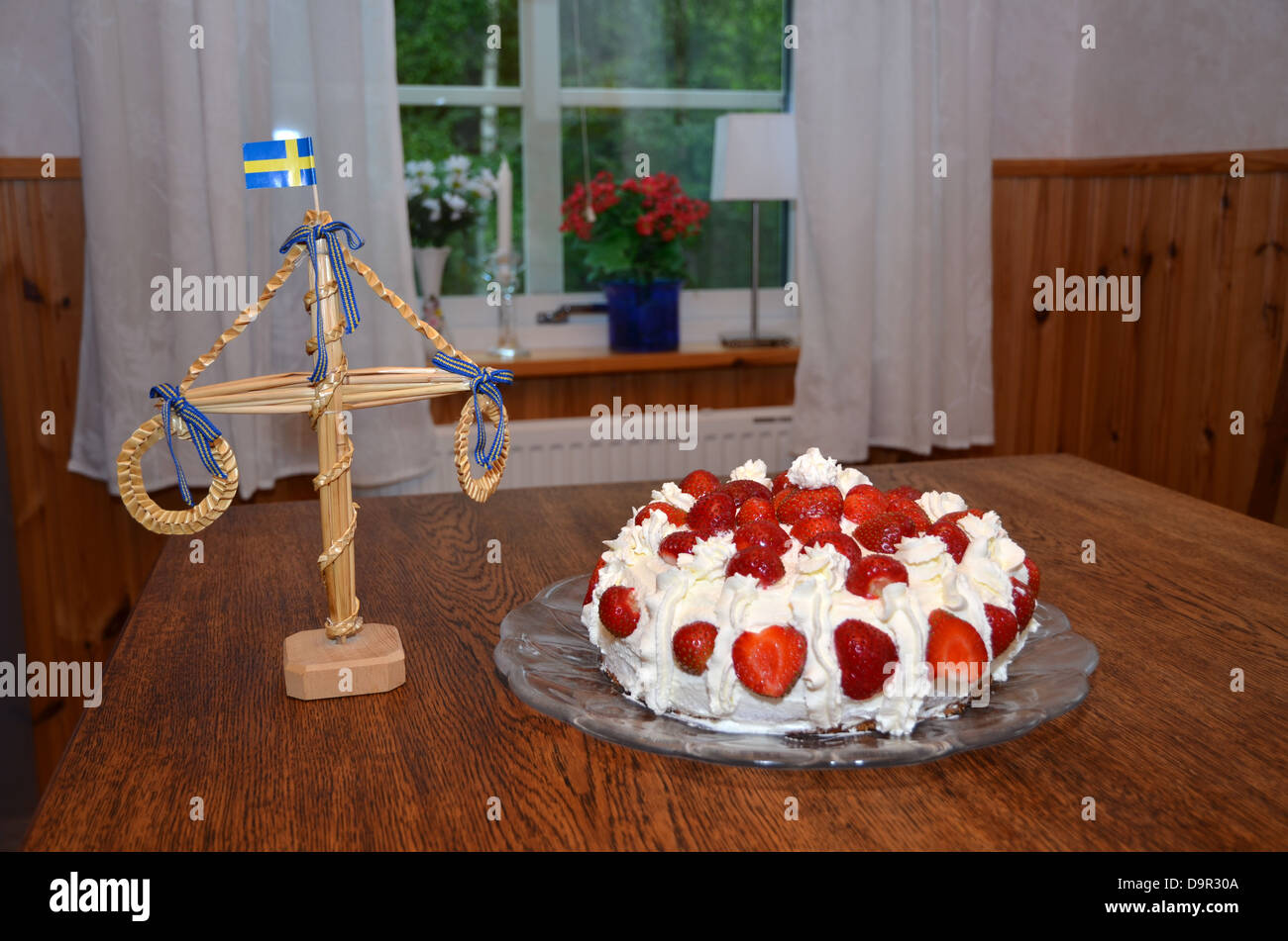 Strawberry cake and small may pole decoration - symbols of Swedish ...