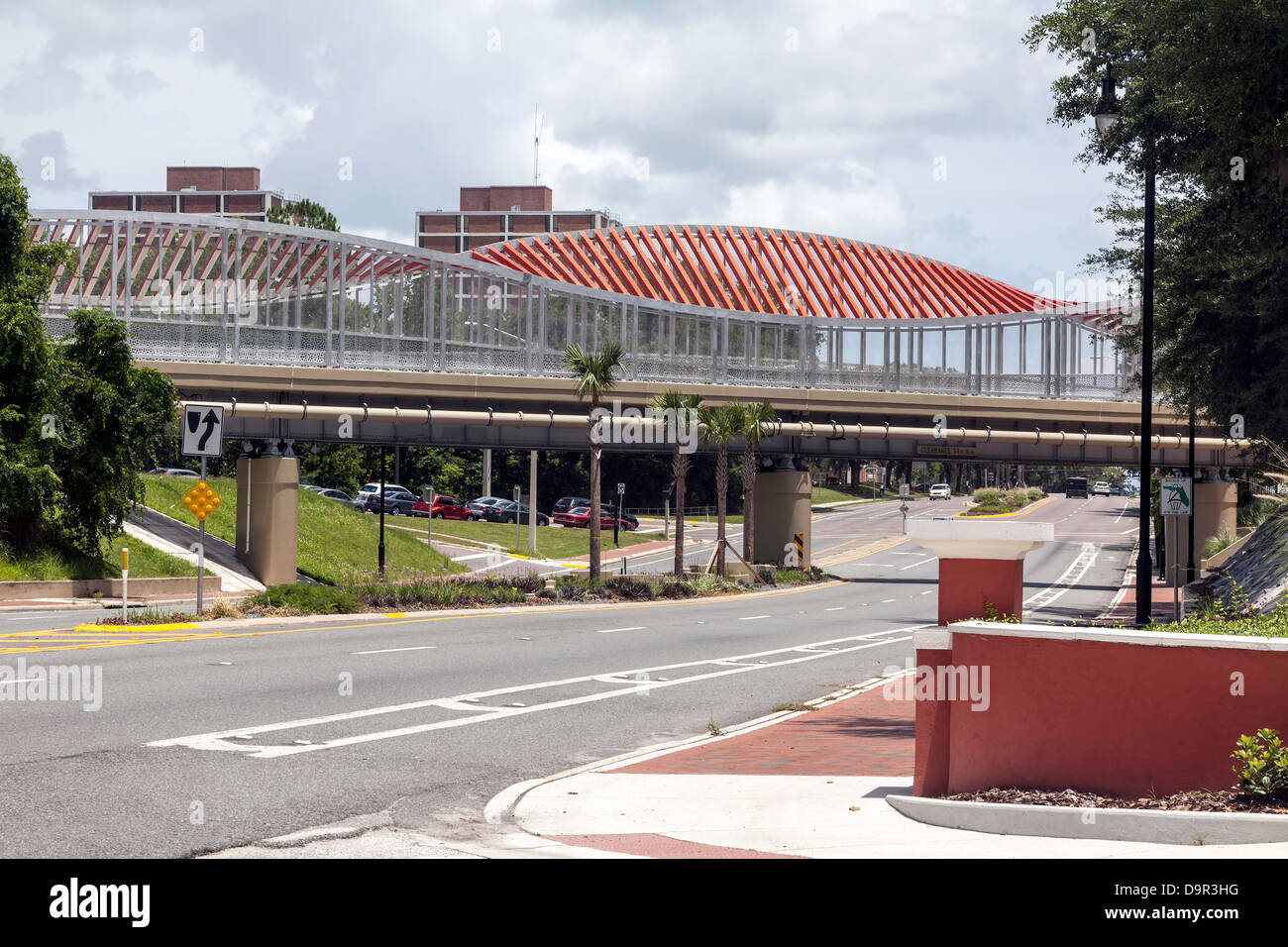 Orange pedestrian bridge across SW 13th Street at intersection with ...