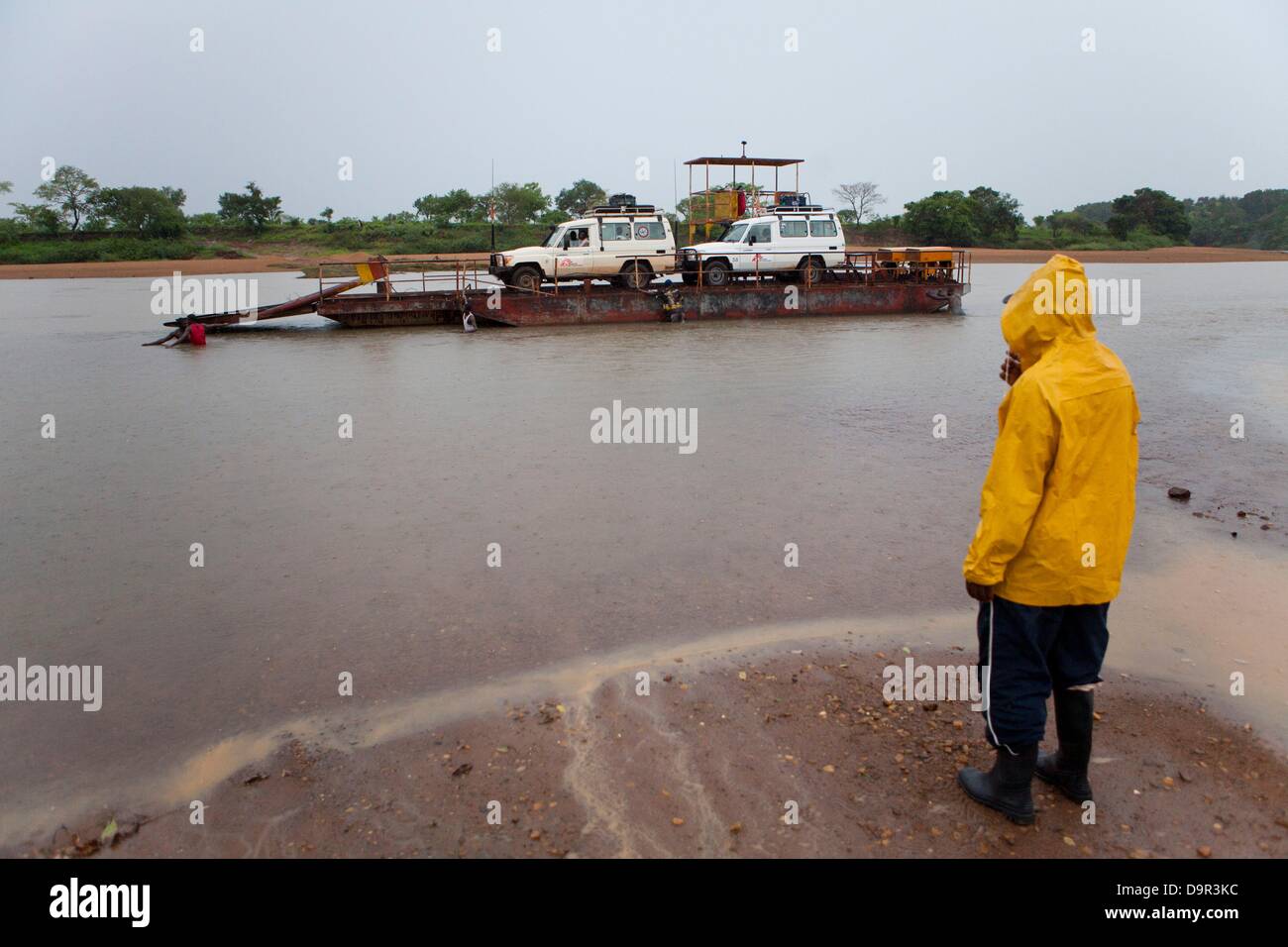Cars of MSF crossing a river in central african republic Stock Photo ...