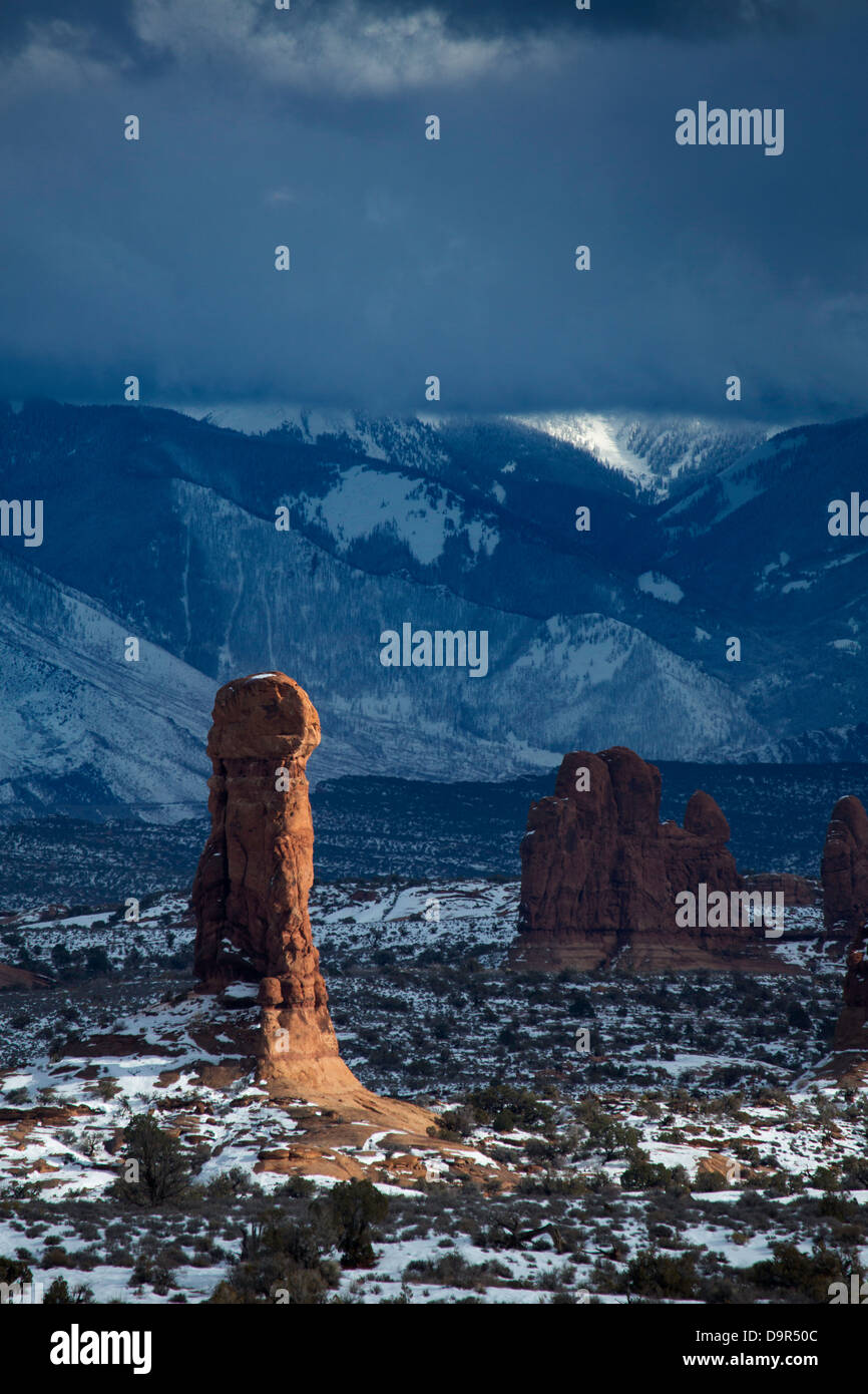 rock stacks in the Windows Section with the La Sal Mountains beyond ...