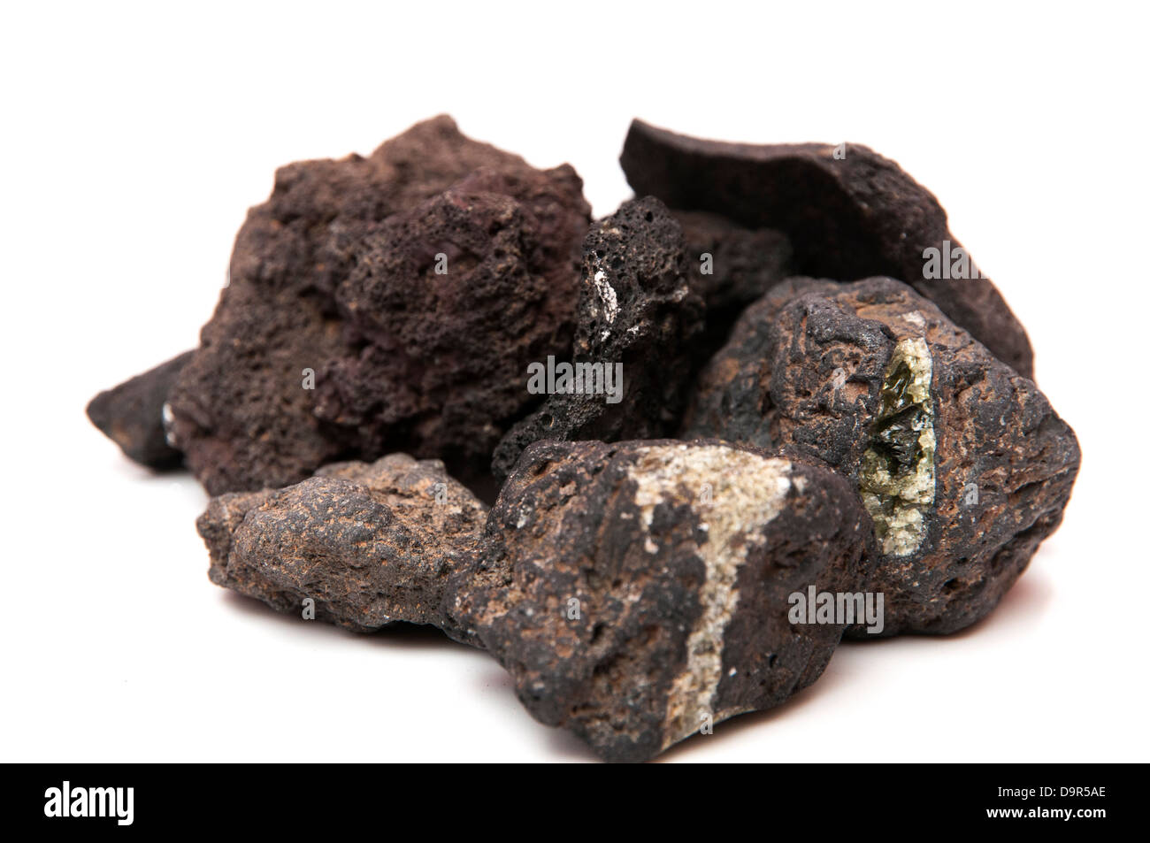 volcanic stones on white background Stock Photo - Alamy