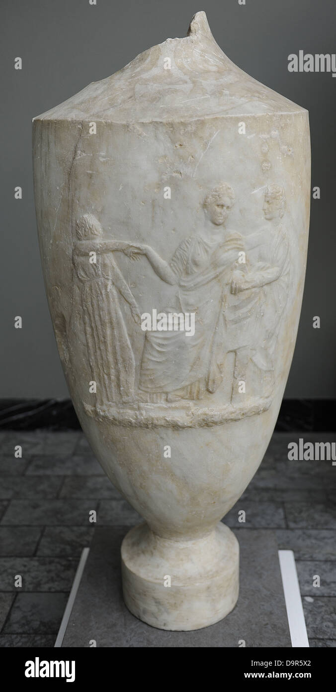 Funerary monument shaped oil bottle (lekythos) with reliefs depicting a ...