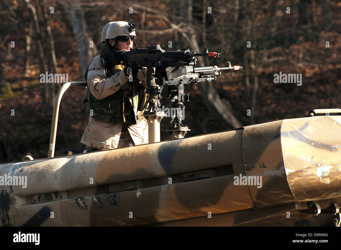 US Navy special forces with the Riverine Squadron One mans the 240Gs ...