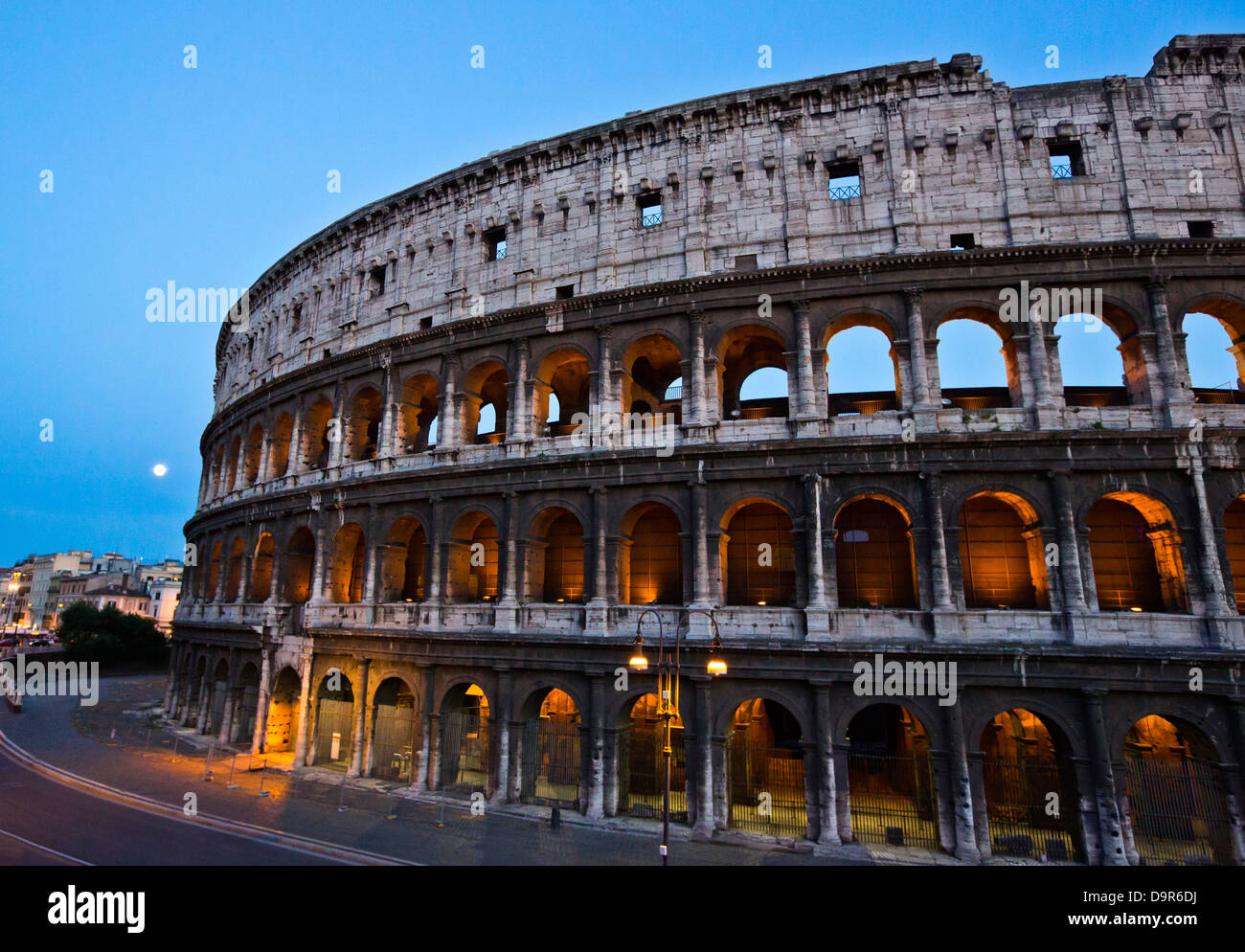 Road passing near an amphitheater, Coliseum, Lazio, Rome, Rome Province ...