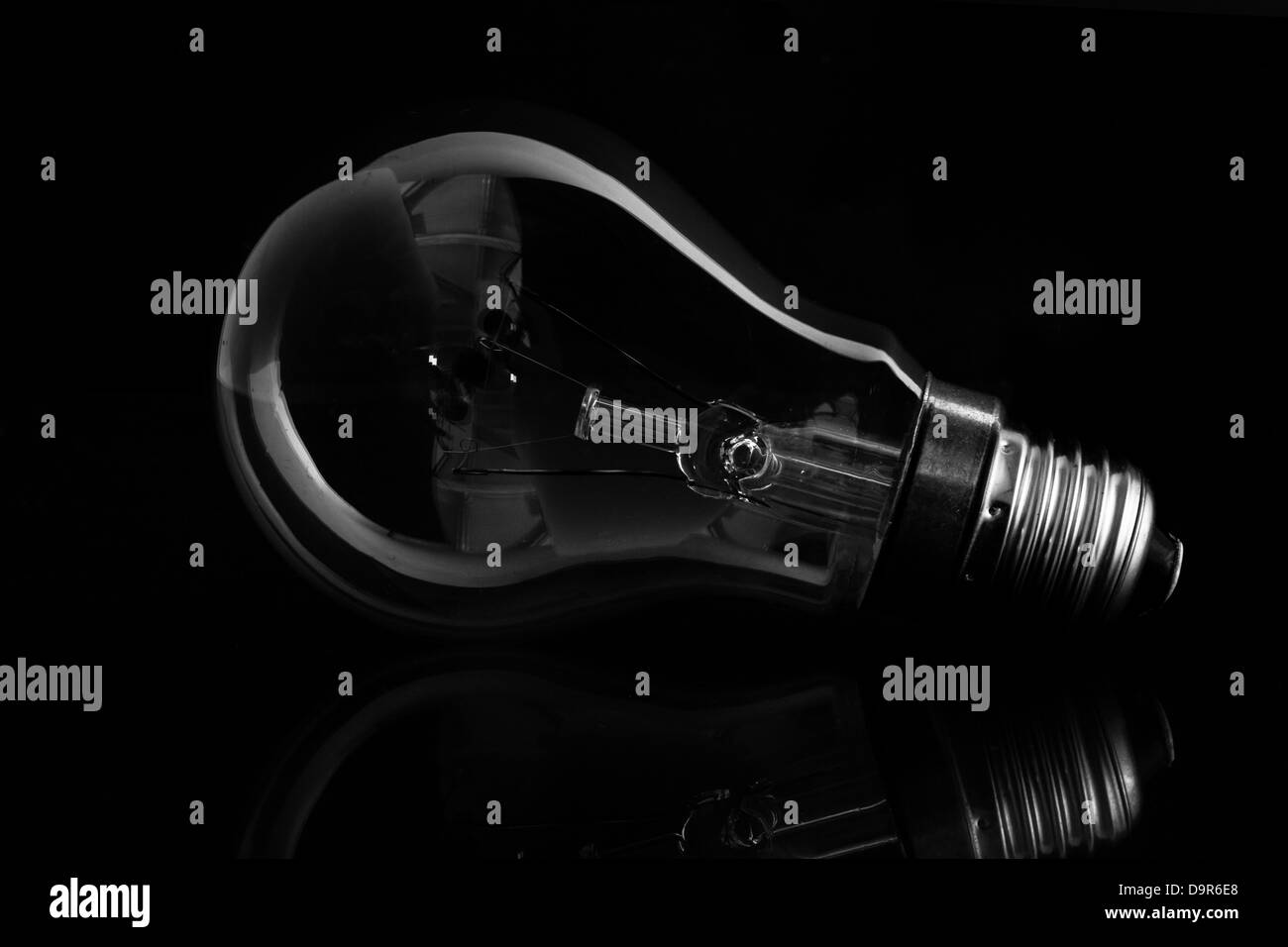 Clear light bulb laying on its side Stock Photo - Alamy