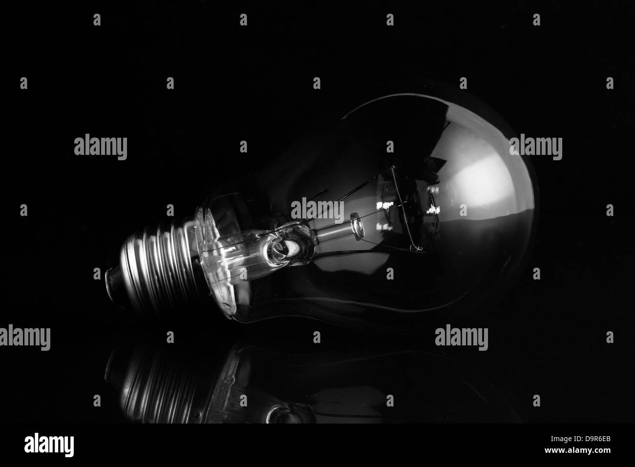 Clear light bulb lying on its side Stock Photo - Alamy