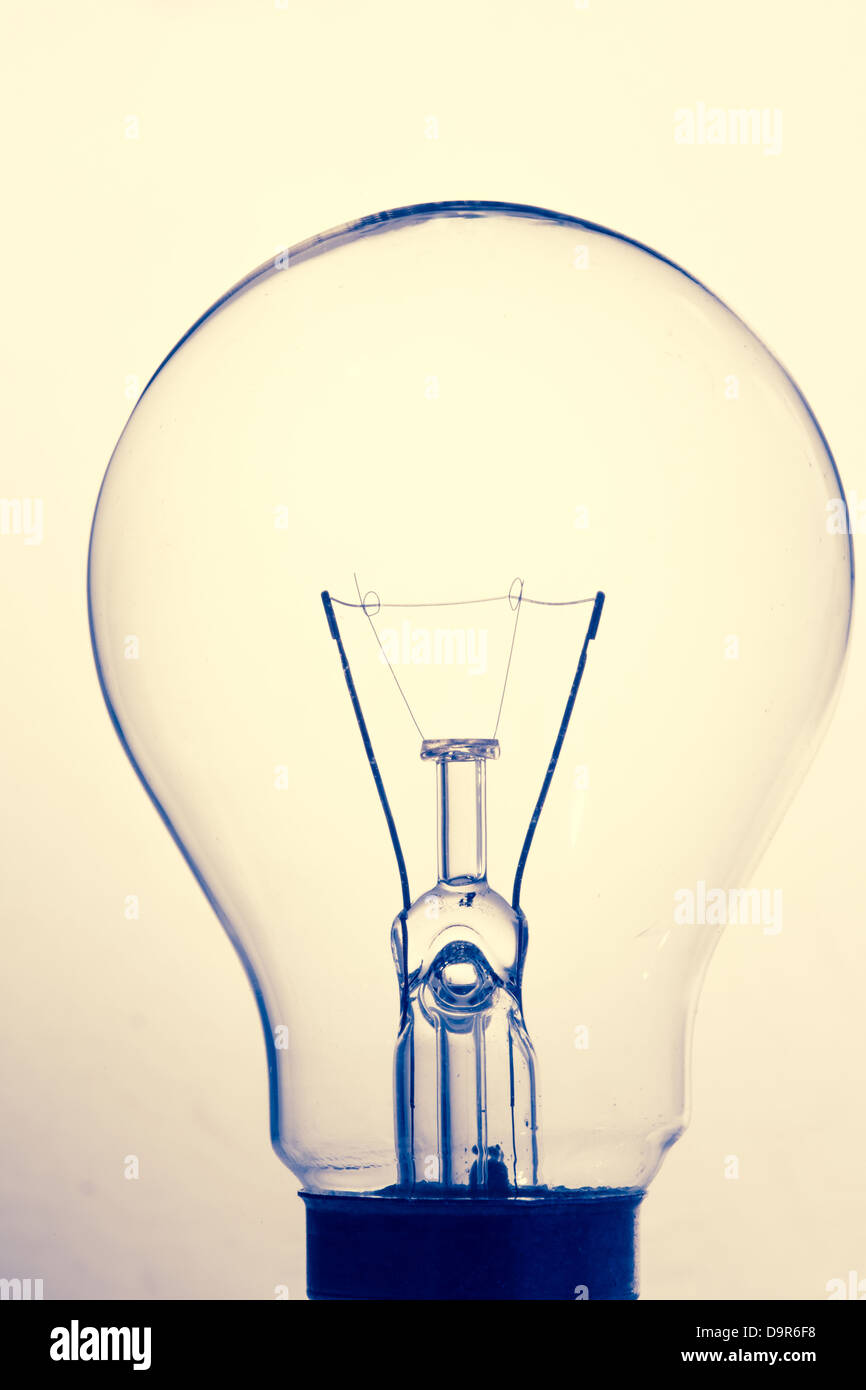 Close up of clear light bulb standing Stock Photo - Alamy