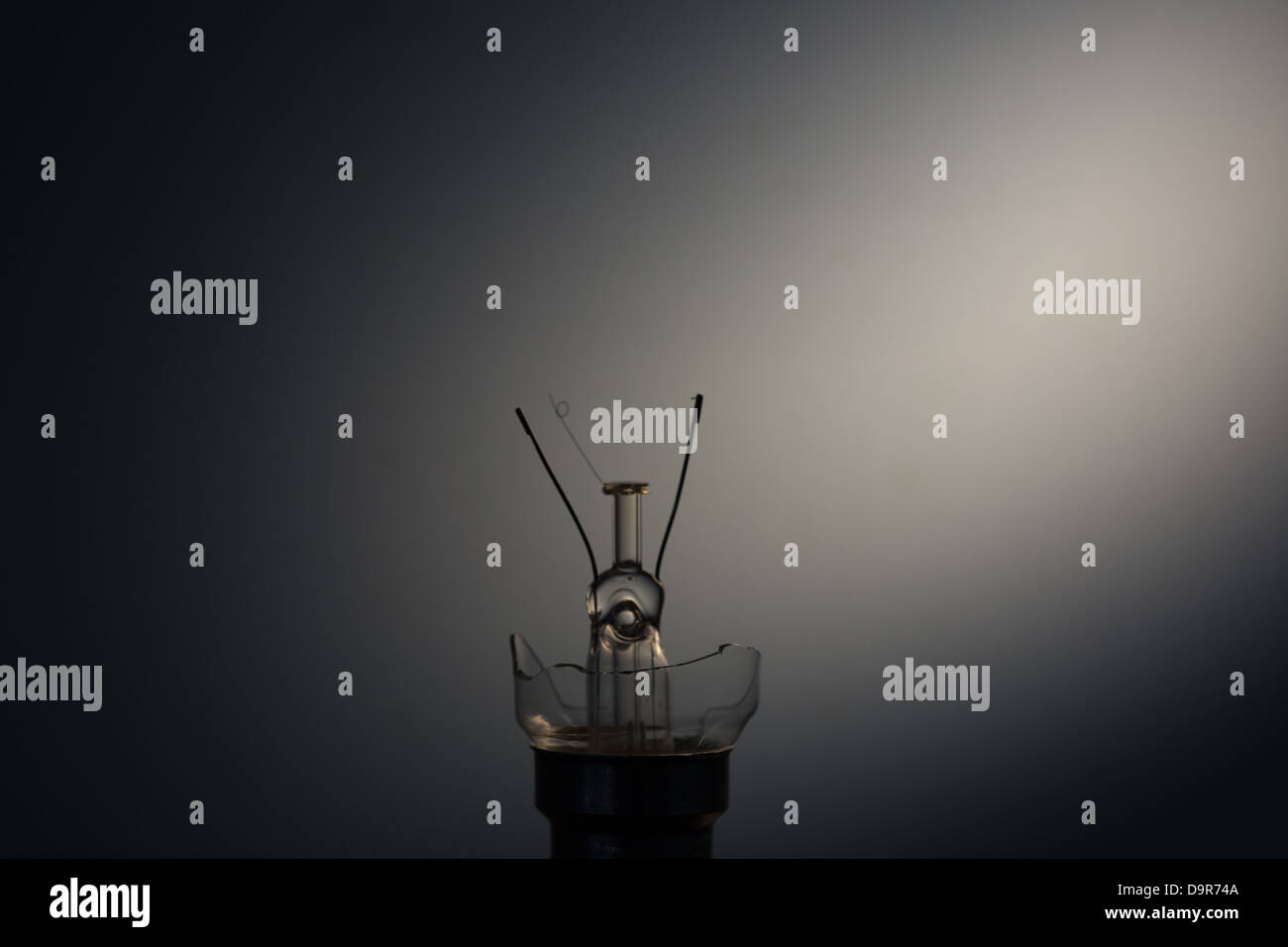 Broken light bulb Stock Photo - Alamy