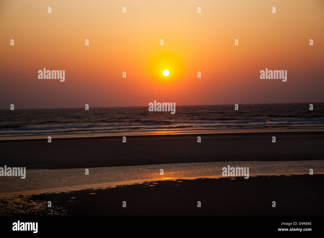 Sunset over the sea, Morjim, Pernem, Goa, India Stock Photo - Alamy