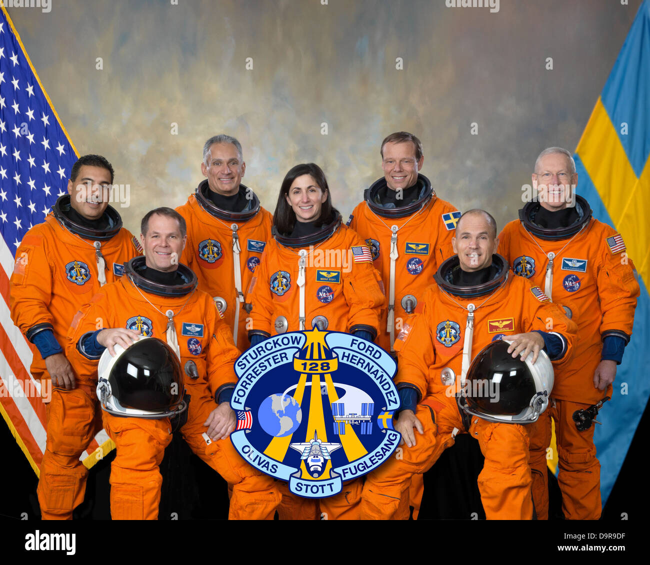 The STS-128 crew photo features astronauts from the Space Shuttle ...