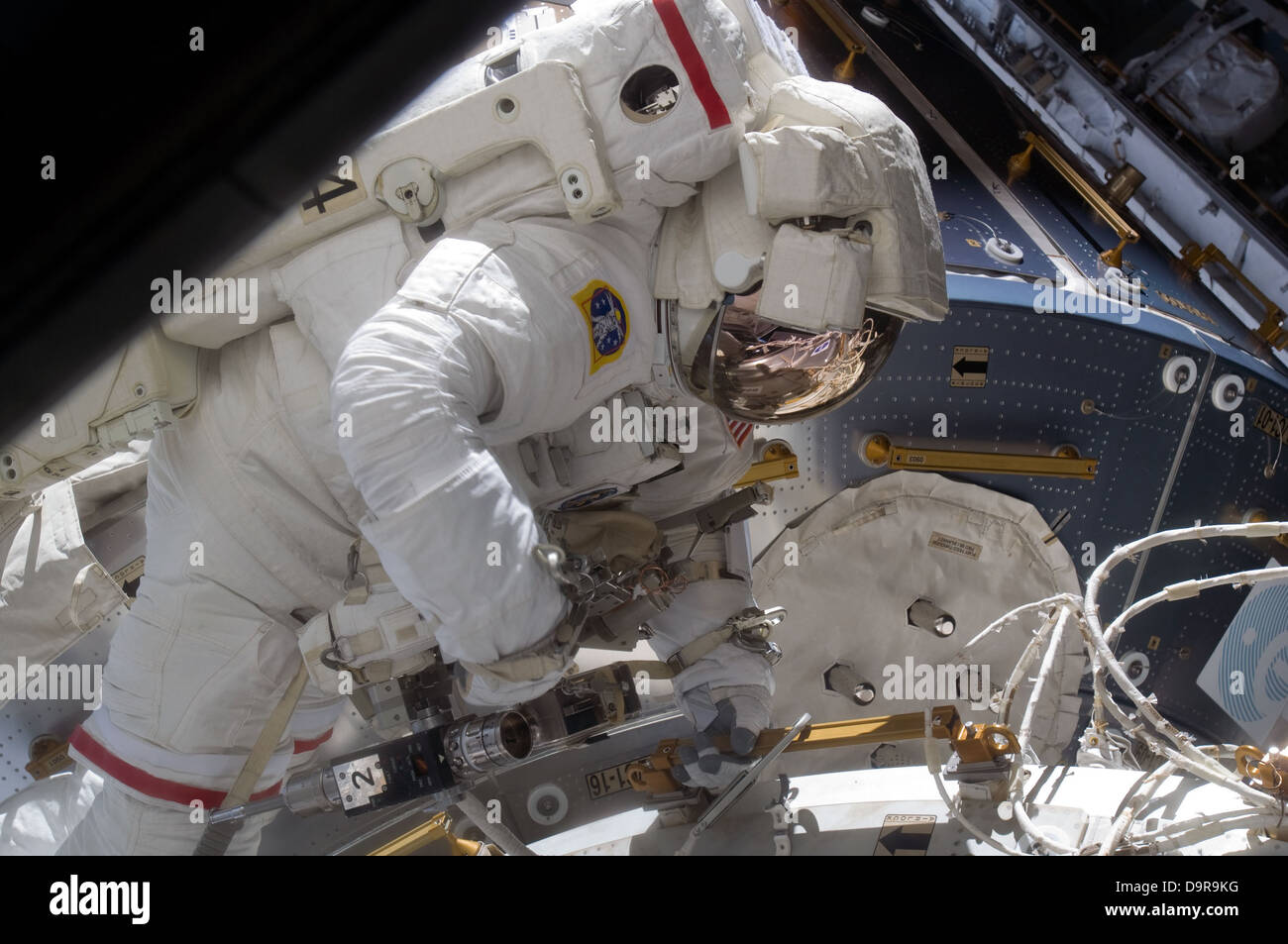 Astronaut Danny Olivas performs an extravehicular activity (EVA) during ...