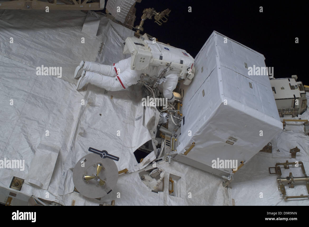 NASA astronaut Danny Olivas conducts a spacewalk during the STS-128 ...