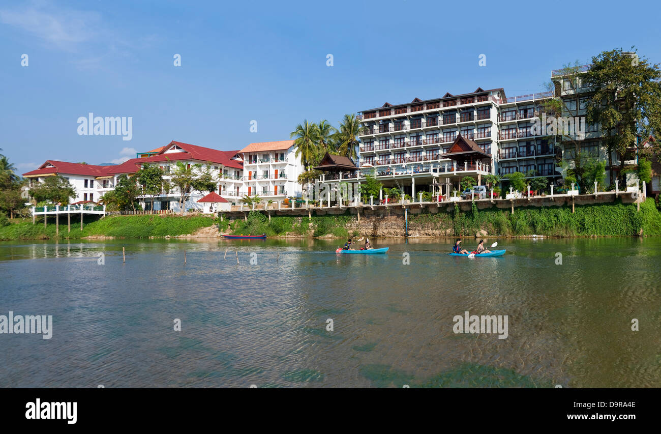 Horizontal panoramic view of the riverside hotels and bars along the ...