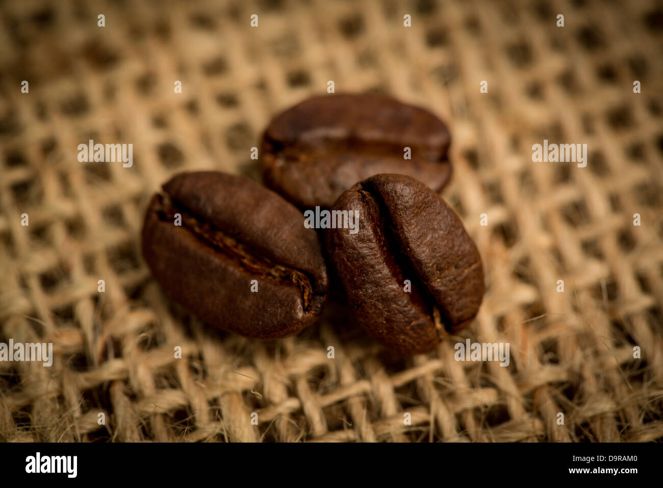 Three coffee beans Stock Photo - Alamy