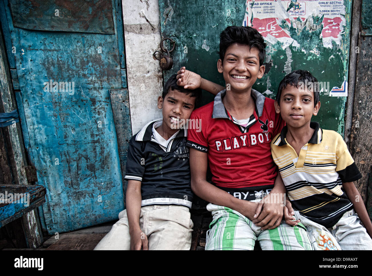 Portrait of children sitting in the streets of Calcutta. West Bengal ...