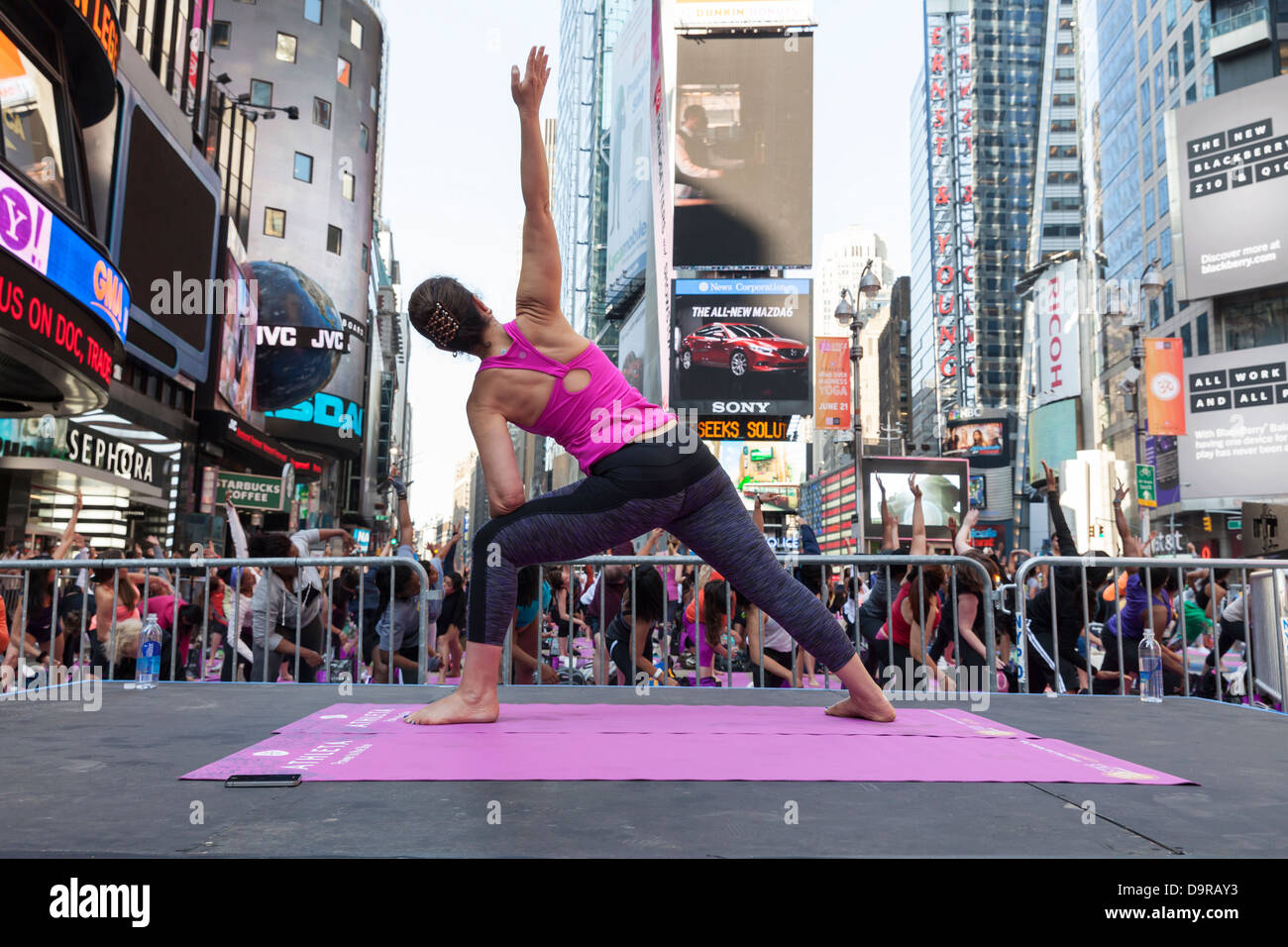 Yoga Solstice at Times Square Stock Photo - Alamy