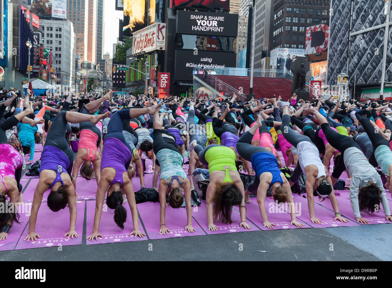 Yoga Solstice at Times Square Stock Photo - Alamy