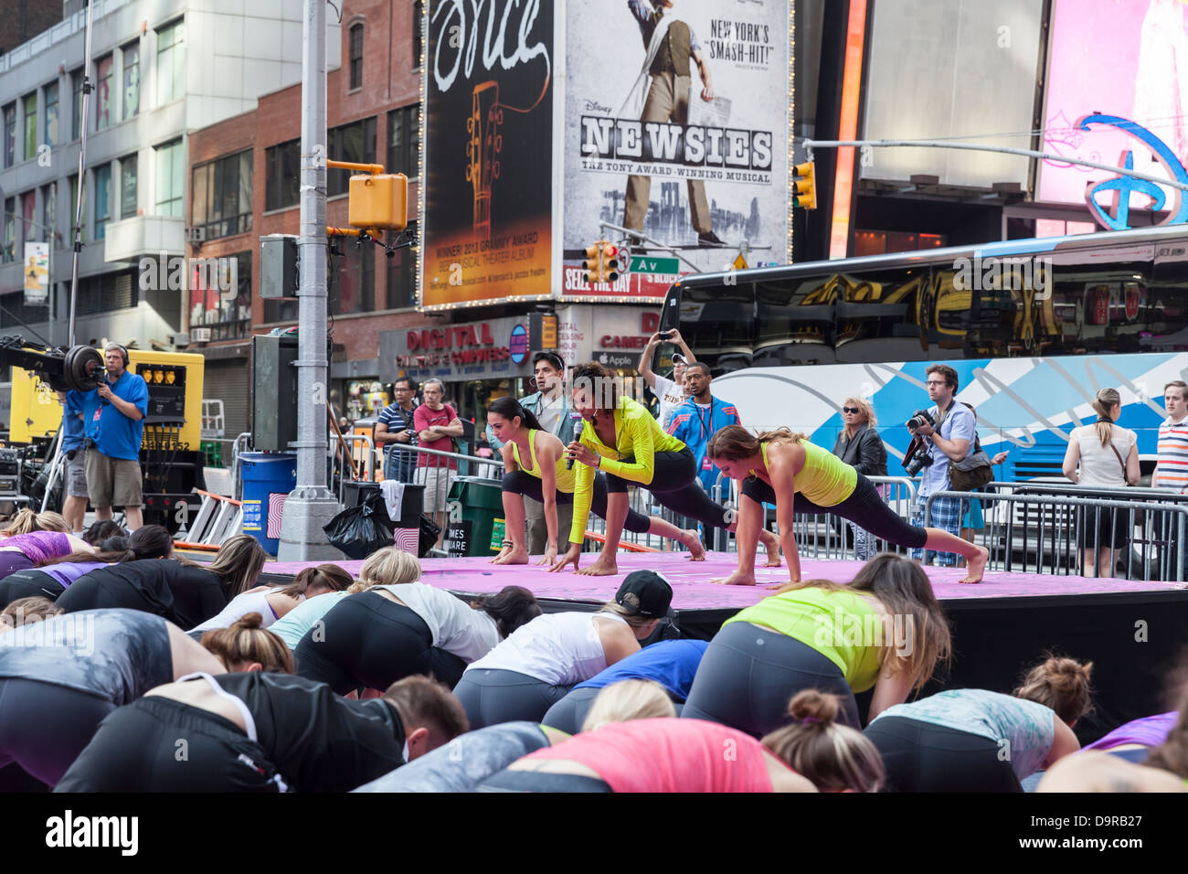 Yoga Solstice at Times Square Stock Photo - Alamy