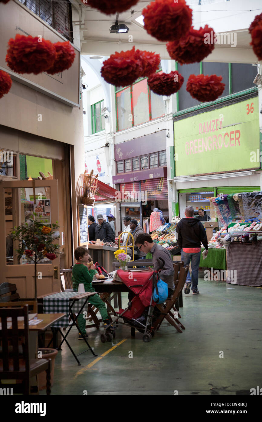 Shops and Cafe in Brixton Market Row - London UK Stock Photo - Alamy