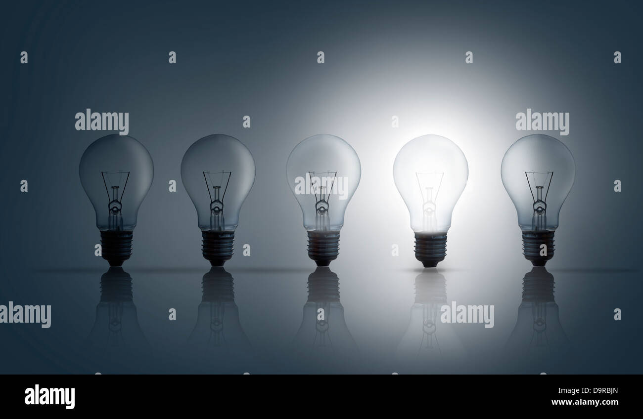 Five light bulbs in row Stock Photo - Alamy