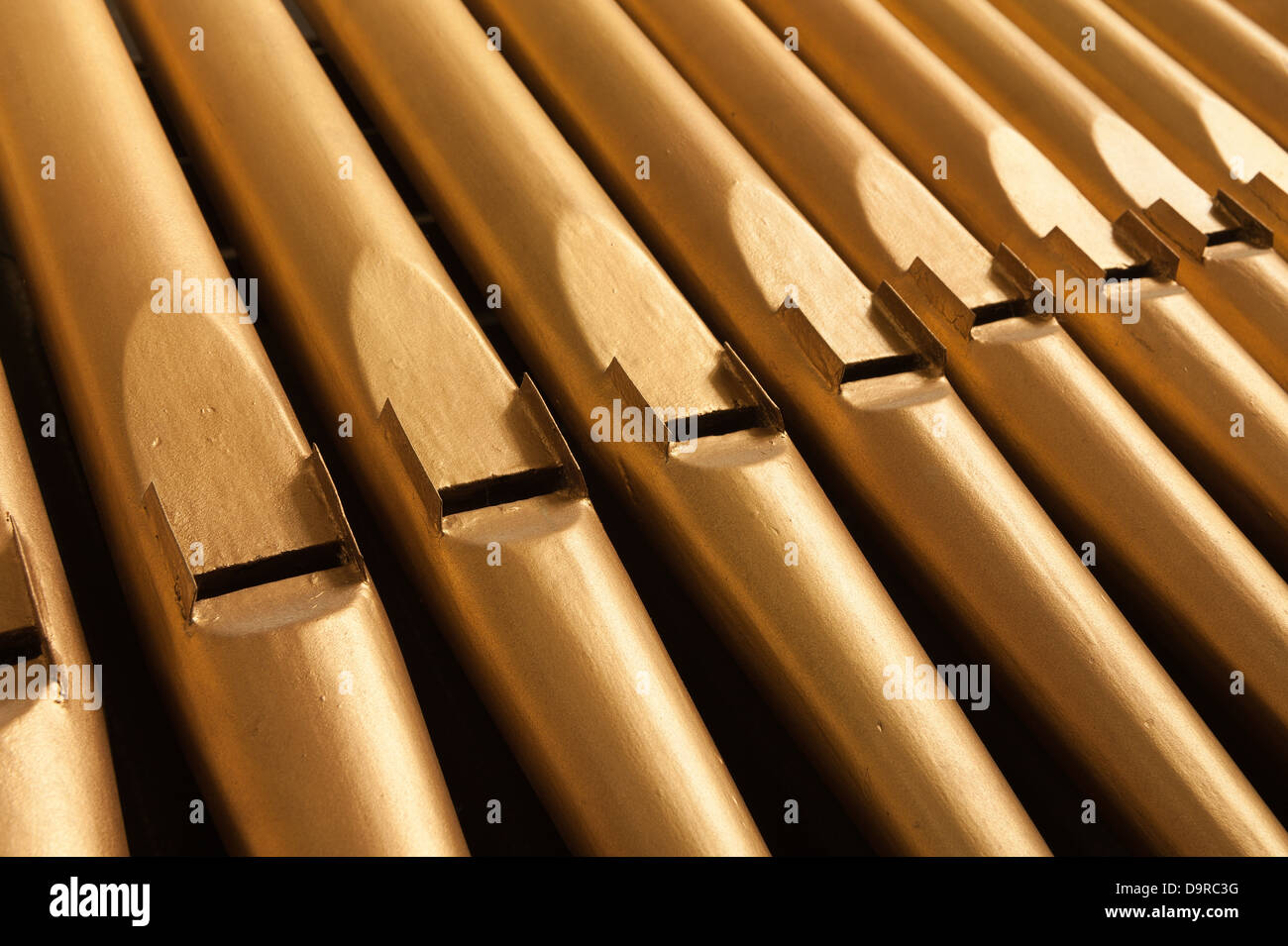 gold painted paint wooden metal church organ pipes wind instrument ...