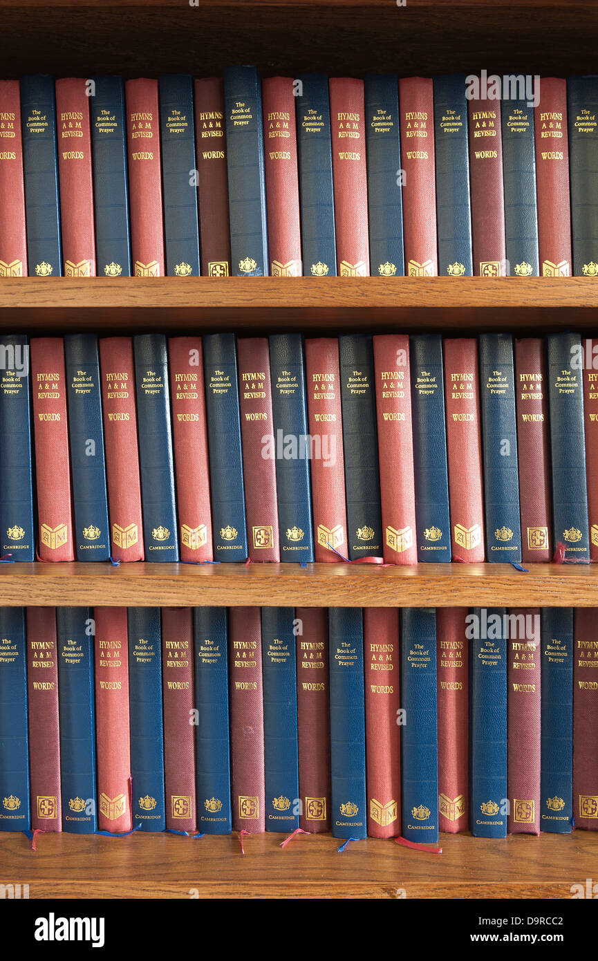 rows of hymn and prayer worship books alternating color neat order on ...