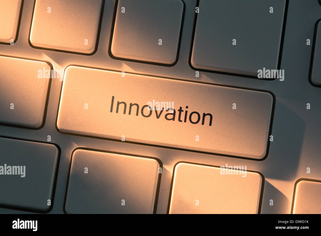 Keyboard with close up on innovation button Stock Photo - Alamy