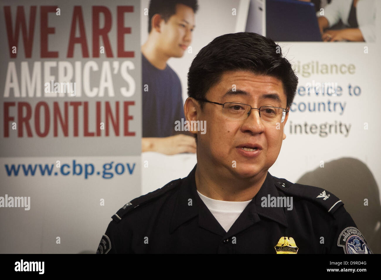 This photo captures the Acting Director for the Immigration Advisory ...